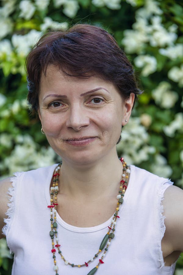Middle Age Woman in the Park in the Spring Stock Photo - Image of ...