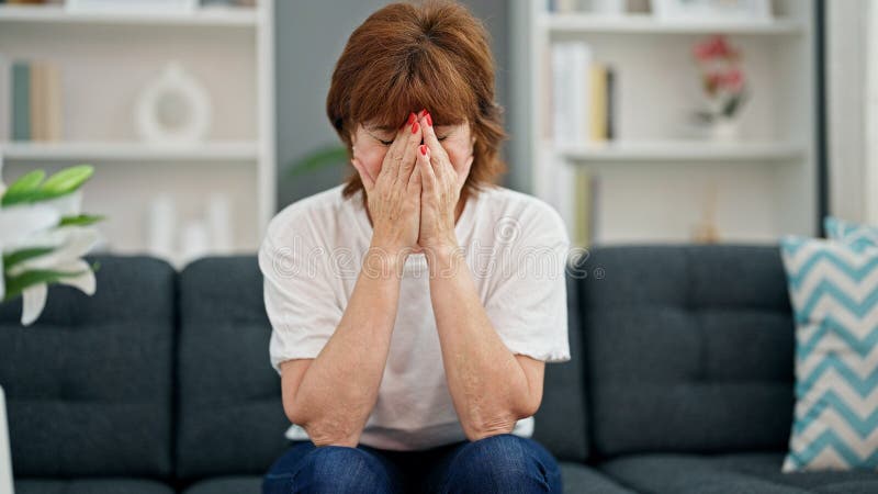 Middle Age Woman Sitting on the Sofa Crying Home Stock Image - Image of ...