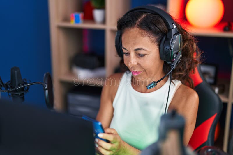 Middle Age Woman Streamer Using Computer and Smartphone at Gaming Room ...