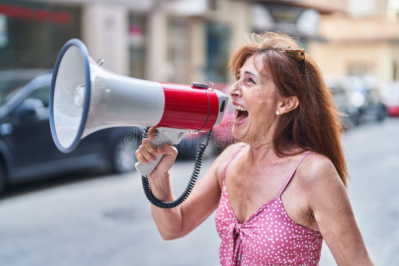 Middle Age Woman Using Megaphone Screaming at Street Stock Image ...