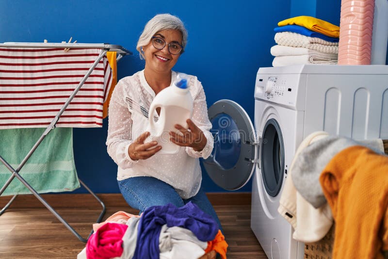 Middle Age Woman Washing Clothes at Laundry Room Stock Image - Image of ...