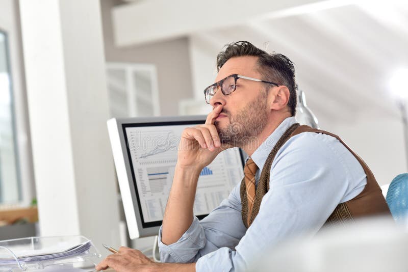 Middle-aged Businessman Thinking and Working Stock Image - Image of ...