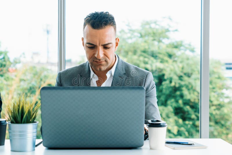 Middle Aged Businessman Using Laptop Computer. Uds Stock Photo - Image ...
