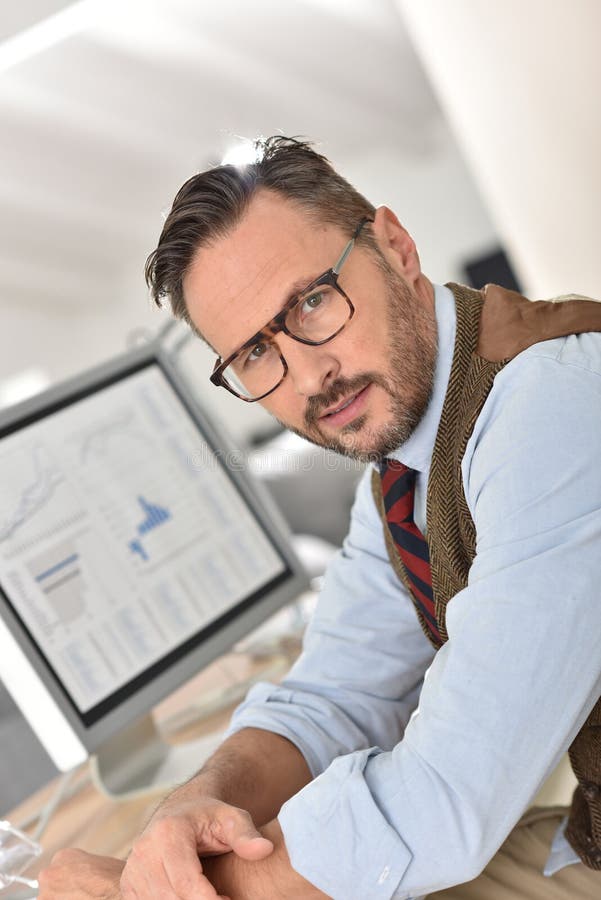 Middle-aged Businessman Working at Office Stock Image - Image of people ...