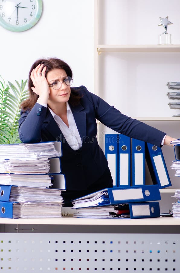 Middle-aged Businesswoman Unhappy with Excessive Work Stock Photo ...