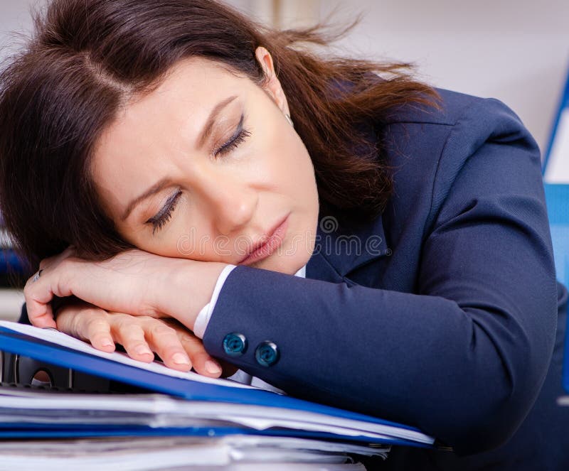 Middle-aged Businesswoman Unhappy with Excessive Work Stock Photo ...