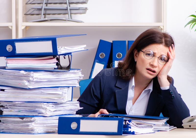 Middle-aged Businesswoman Unhappy with Excessive Work Stock Photo ...