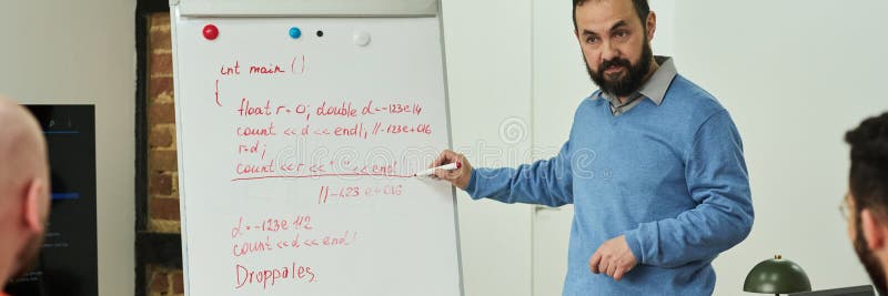 Middle Aged Caucasian Man Explaining Coding Concepts To Incarcerated ...