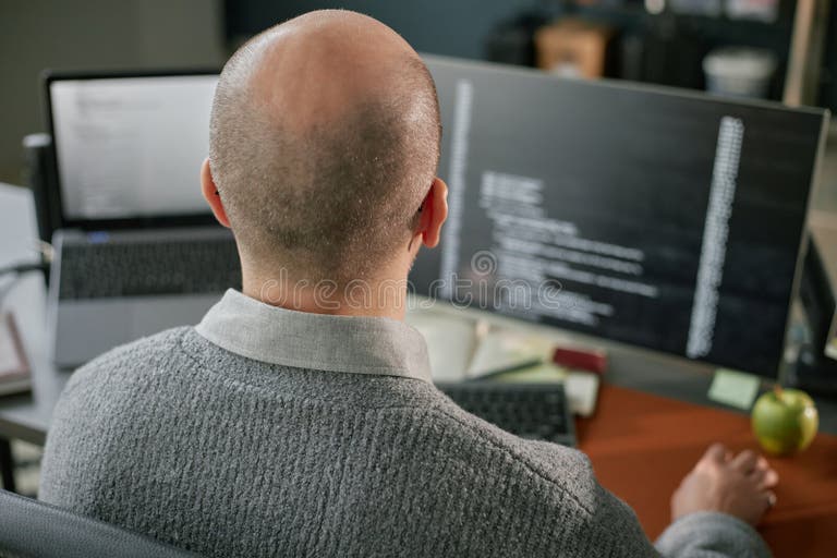 Middle Aged Caucasian Man Working on Computer Monitors in Office ...
