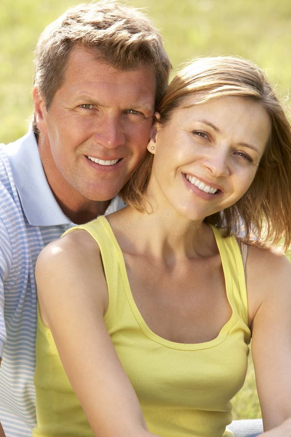 Middle Aged Couple Having Fun in Countryside Stock Image - Image of ...