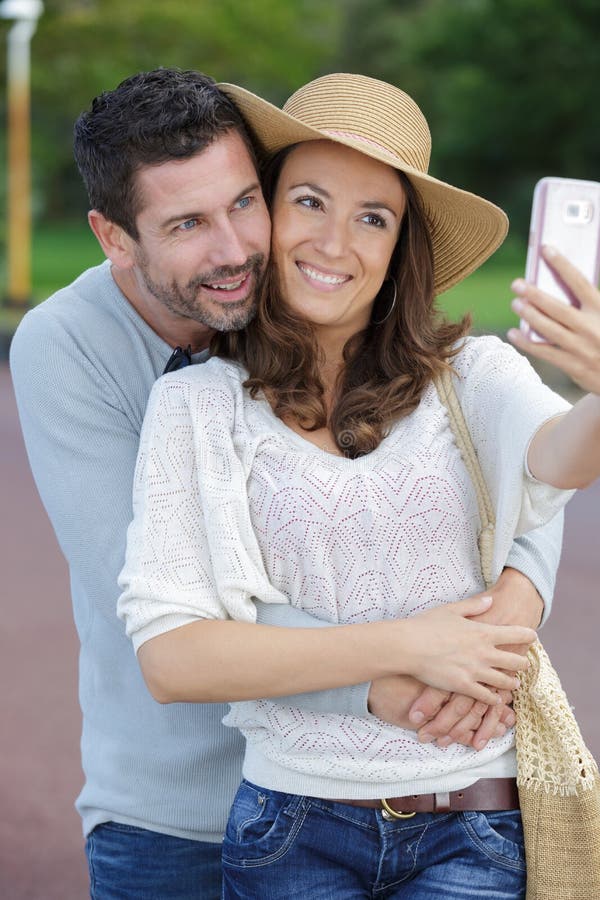 Middle Aged Couple Making Selfie on Smartphone Stock Image - Image of ...