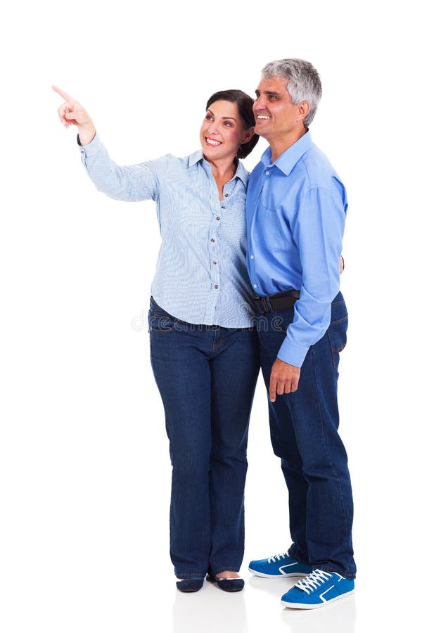 Middle Aged Couple Pointing Stock Photo - Image of relationship, cutout ...