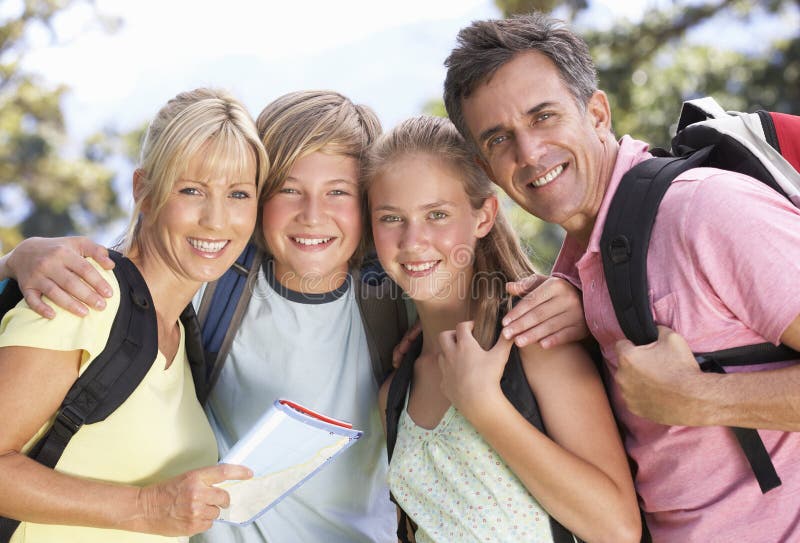 Middle Aged Family Hiking through Countryside Stock Image - Image of ...