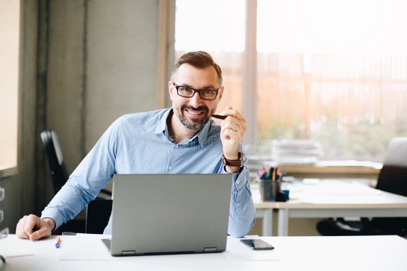 Middle Aged Handsome Man in Shirt Working on Laptop Computer in Office ...