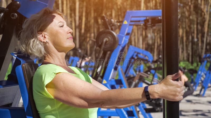 Middle-aged Lady Does Strength Training for Upper Body Stock Image ...