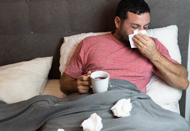 Middle-aged Man in Bed Sick with Flu Symptoms Stock Photo - Image of ...