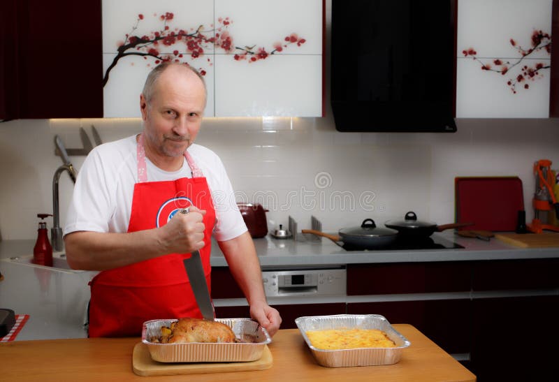 A Man is Cooking in the Kitchen Stock Image - Image of beard, cuisine ...