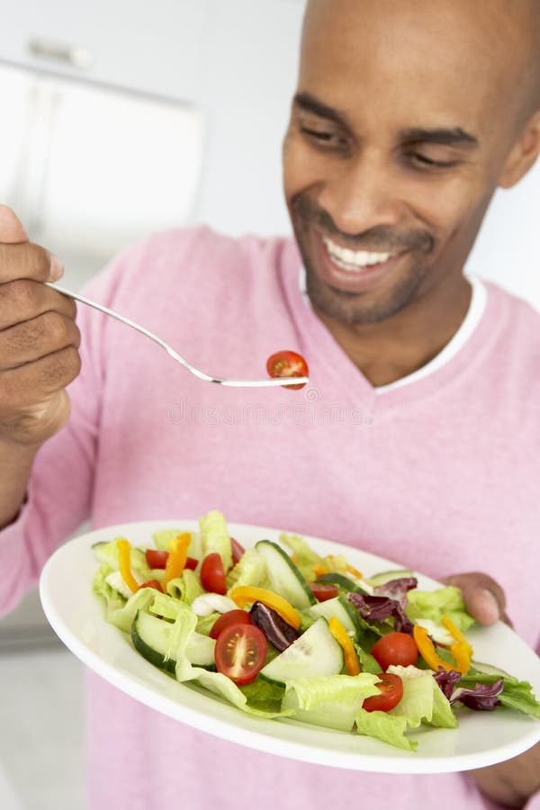 Middle Aged Man Eating Healthy Salad Stock Photo - Image of holding ...