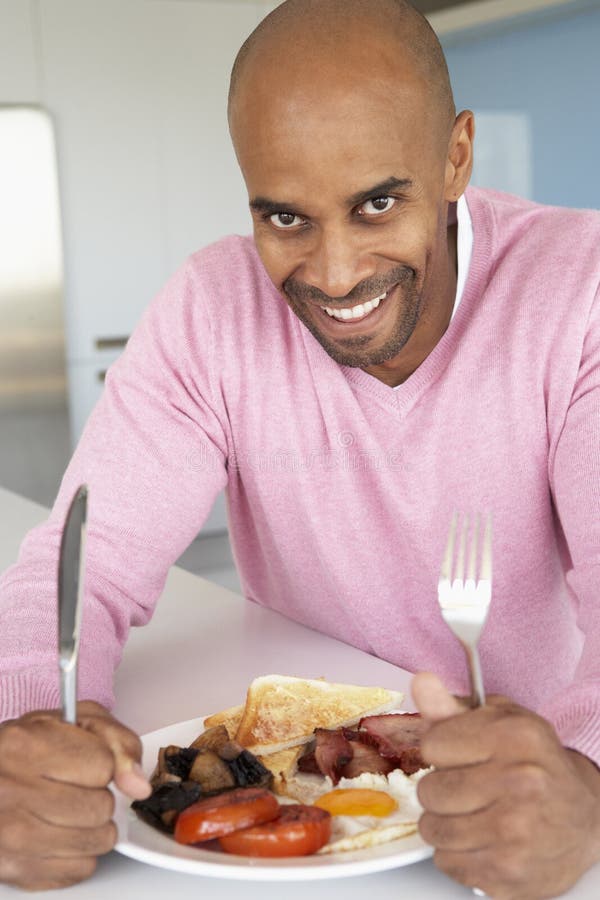 Middle Aged Man Eating Unhealthy Fried Breakfast Stock Photo - Image of ... Middle Aged Man Eating Unhealthy Fried Breakfast Stock Photo - Image of ...