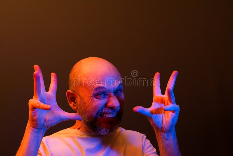 Middle-aged Man, Funny, Cheerful, Making Hand and Face Gestures Stock ...