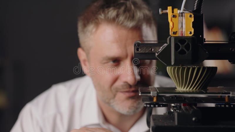 A Middle Aged Man Graphic Designer Observes the Working Process of 3d ...