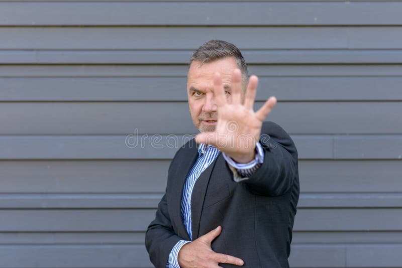 Middle Aged Man with Hand in Front of Face Stock Photo - Image of ...