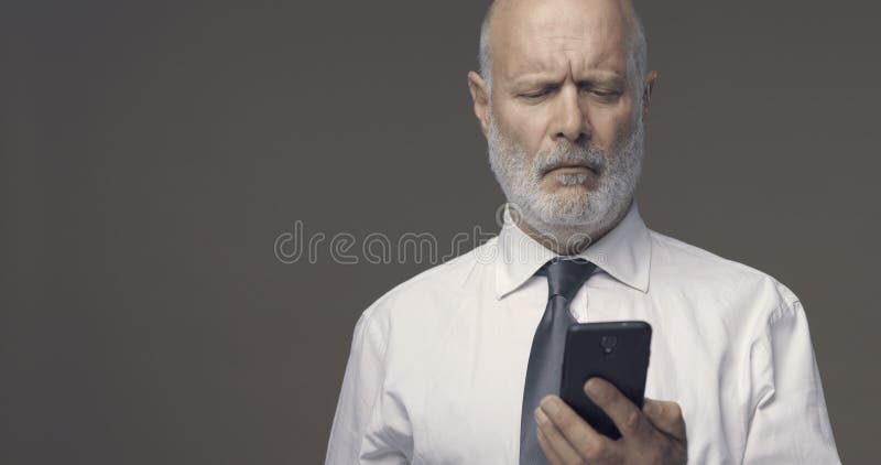 Middle-aged Man Having Difficulties and Vision Problems Using His ...