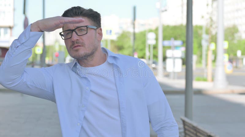 Man Looking Around for Opportunity Outdoor Stock Photo - Image of ...