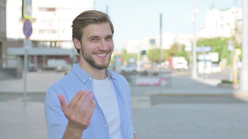 Man Pointing at the Camera and Inviting Outdoor Stock Photo - Image of ...