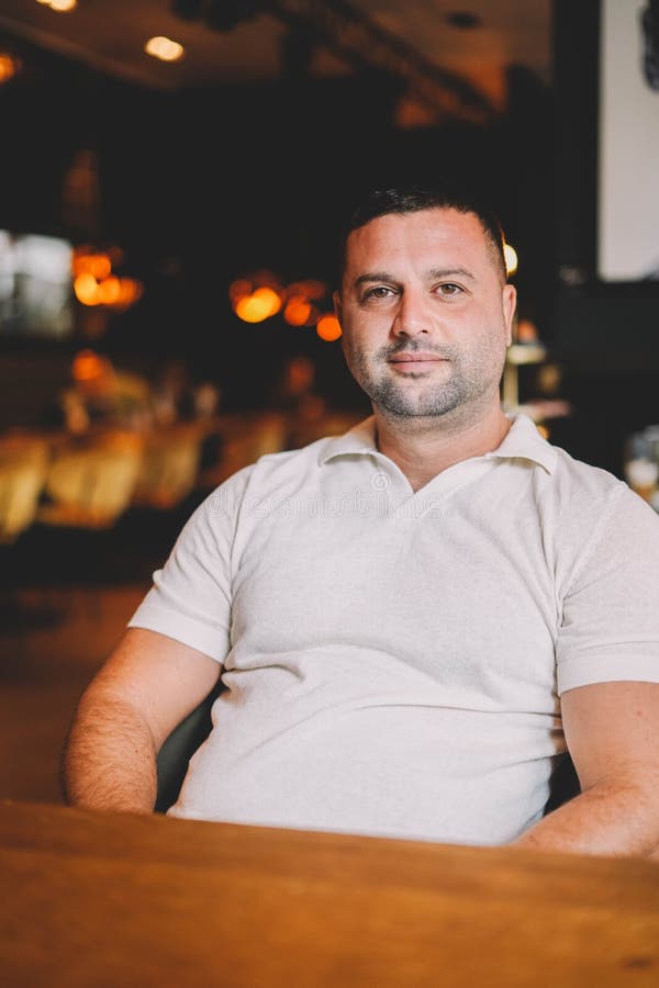 Middle Aged Man Sitting in a Bar Having Breakfast Stock Photo - Image ...