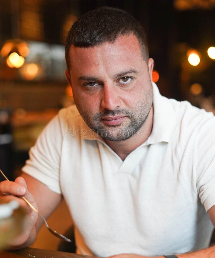 Middle Aged Man Sitting in a Bar Having Breakfast Stock Image - Image ...
