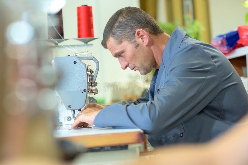 Middle Aged Man Using Sewing Machine Stock Image - Image of creative ...