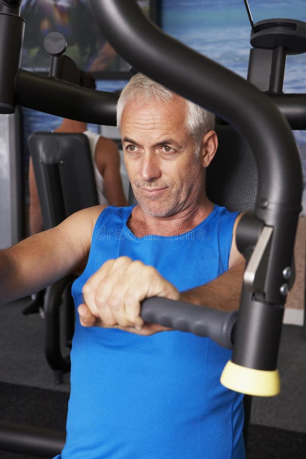 Middle Aged Man Exercising Stock Photos - Download 706 Royalty Free Photos
