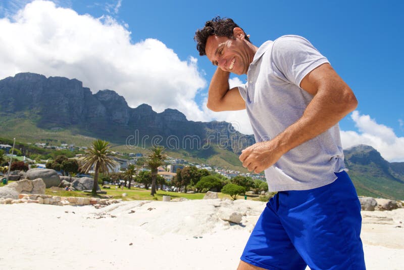 Middle Aged Man Walking on the Beach in Summer Stock Photo - Image of ...
