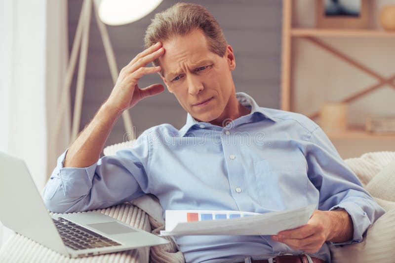 Middle aged man working stock image. Image of classic - 69785411