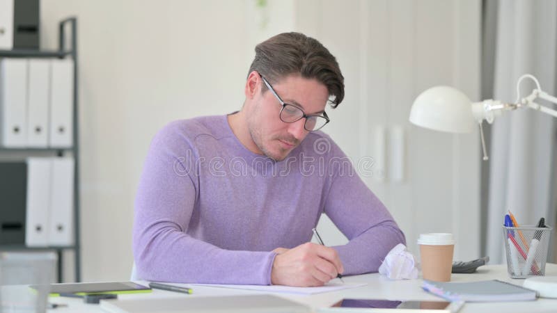 Middle Aged Man Writing on Paper Stock Image - Image of paperwork, work ...