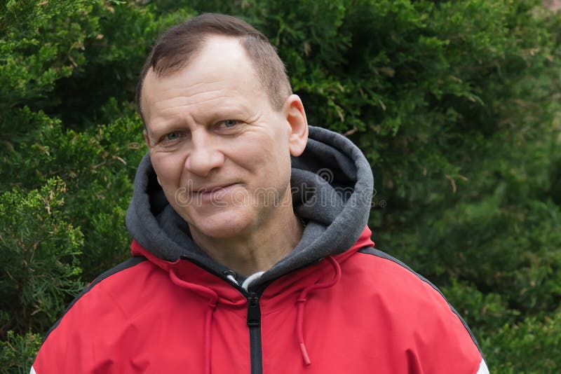 Middle-aged Man, 55 Years Old, Smiling, in Front of Nature Stock Photo ...