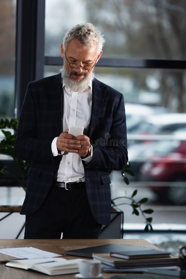 Middle Aged Manager in Suit Using Stock Photo - Image of mature ...