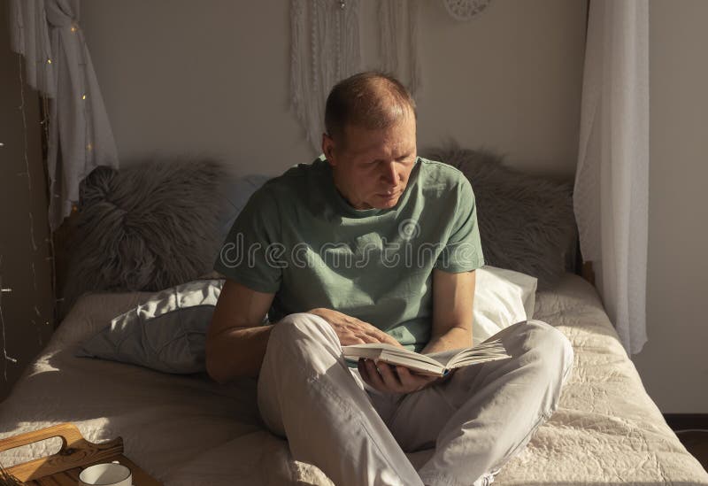 Middle-aged Mature Man Reading Book in Cozy Home, Daylight Stock Image ...