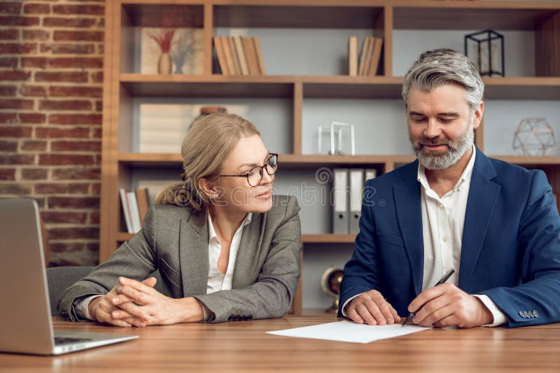 Middle-aged Psychotherapist Working Together Preparing for Therapy ...