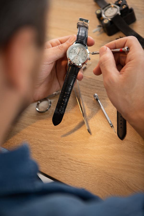 Middle Aged Repairman Working on Old Clock in Workshop Stock Image ...