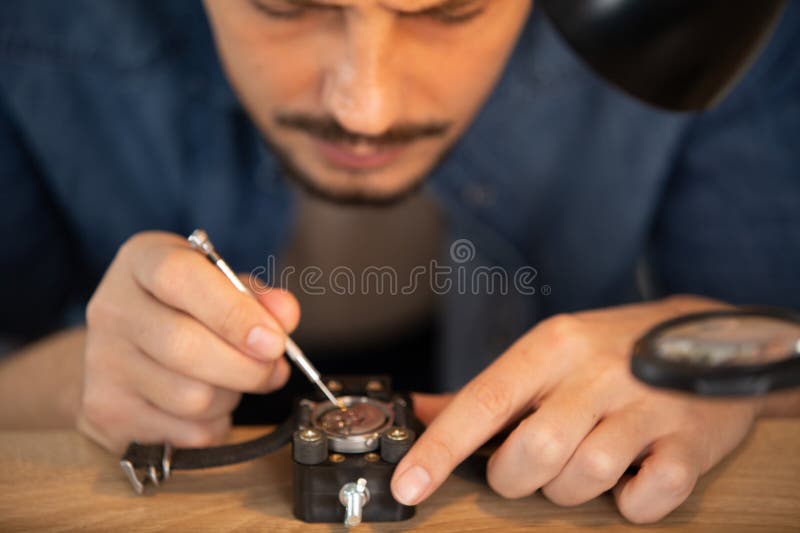 Middle Aged Repairman Working on Old Clock in Workshop Stock Image ...