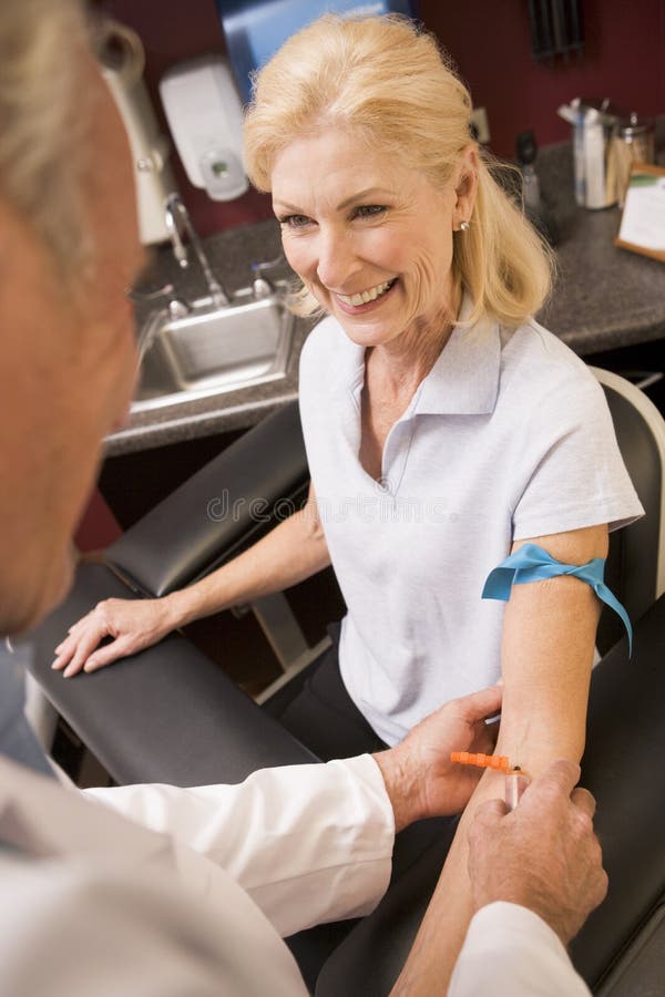 Middle Aged Woman Having Blood Test Done Stock Photo - Image of donor ...
