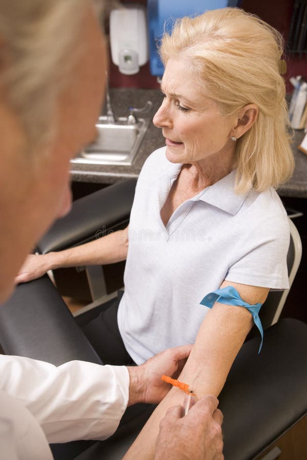 Middle Aged Woman Having Blood Test Done Stock Image - Image of ...