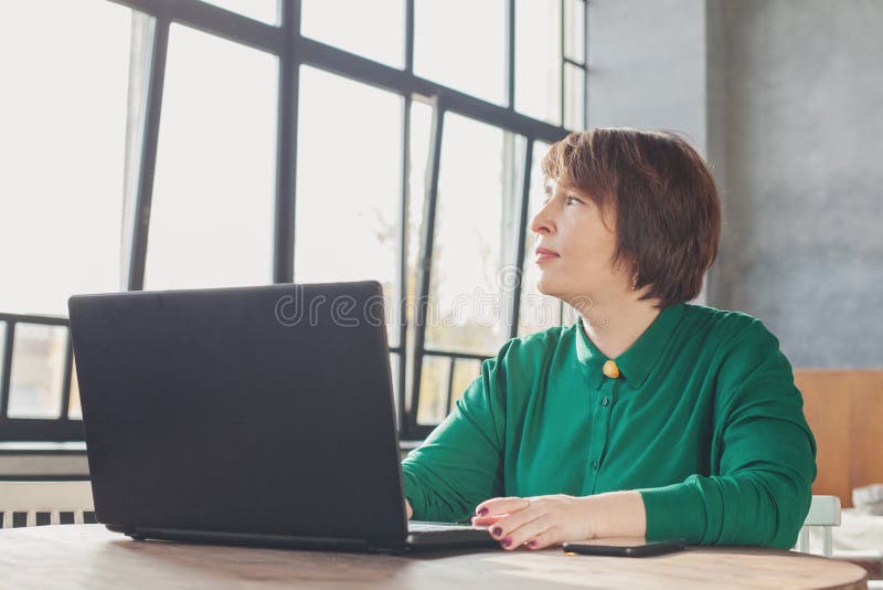 Middle Aged Woman Working Laptop Computer Indoors Stock Image - Image ...