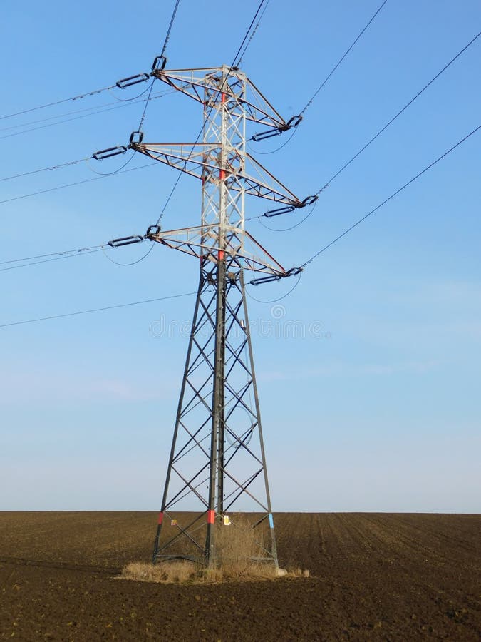 High Voltage Pylon in the Field Stock Photo - Image of pylon ...
