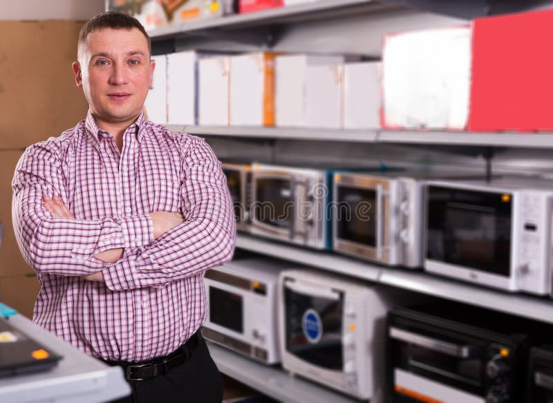 Middle-class Man in Appliances Store Stock Image - Image of discount ...
