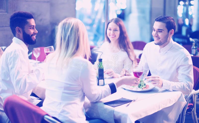 Middle Class People Enjoying Food in Cafe Terrace Stock Image - Image ...