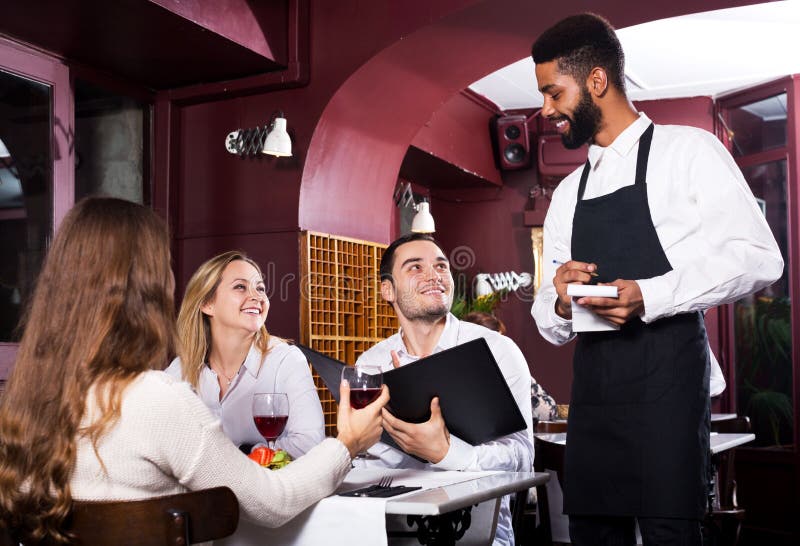 Middle Class Restaurant and Cheerful Waiter Stock Image - Image of ...