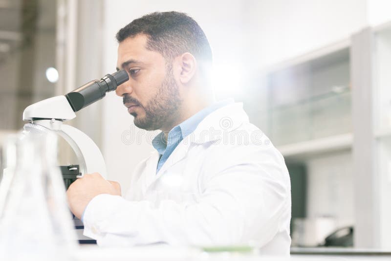 Middle-eastern Genetic Engineer at Work Stock Photo - Image of clinic ...